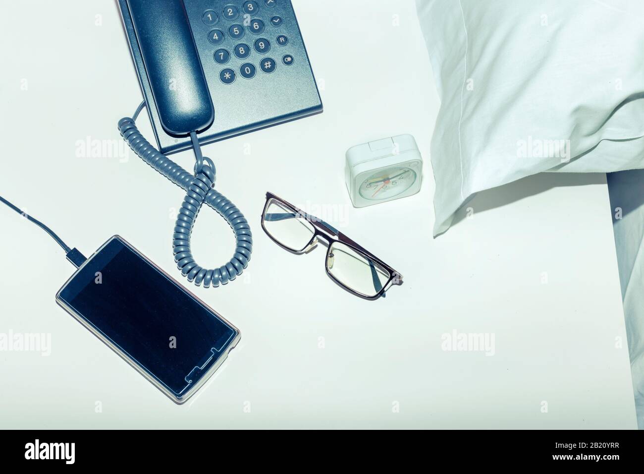 Digital clock on bedside hi-res stock photography and images - Alamy