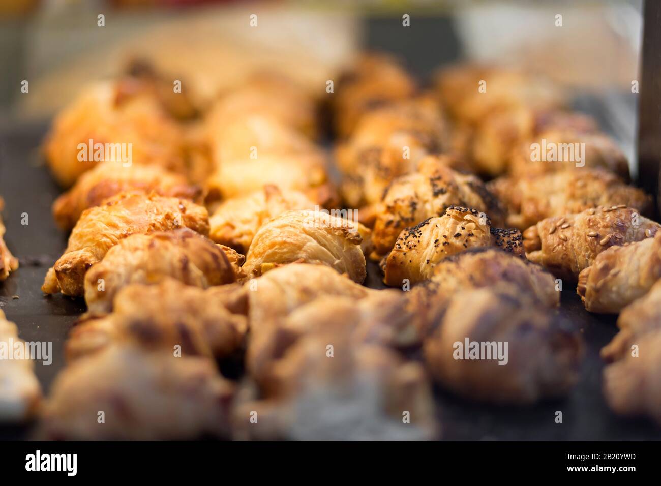 baked mini croissants coming out of the oven Stock Photo - Alamy
