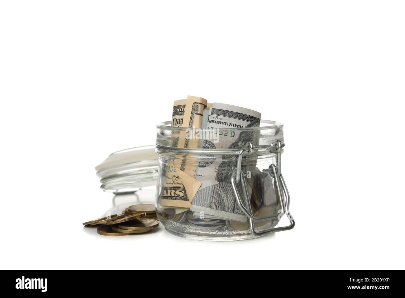 Glass jar with money isolated on white background Stock Photo - Alamy