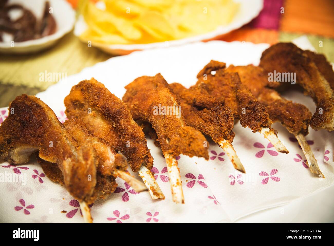 view of raw breaded lamb ribs ready to eat in a celebration Stock Photo ...