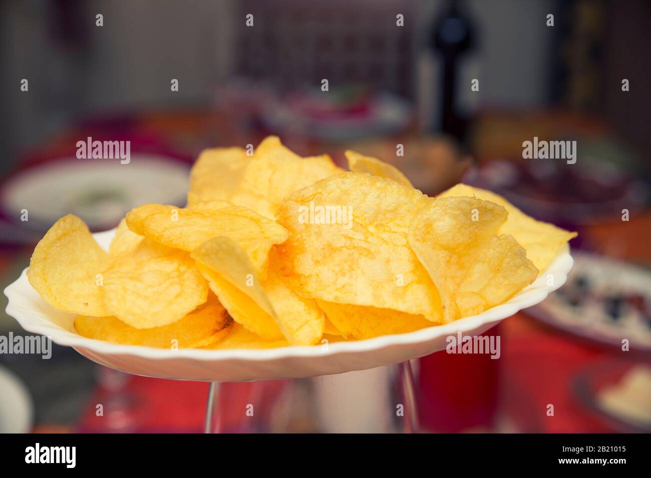 front view of yellow fried chips for an appetizer at a party Stock ...