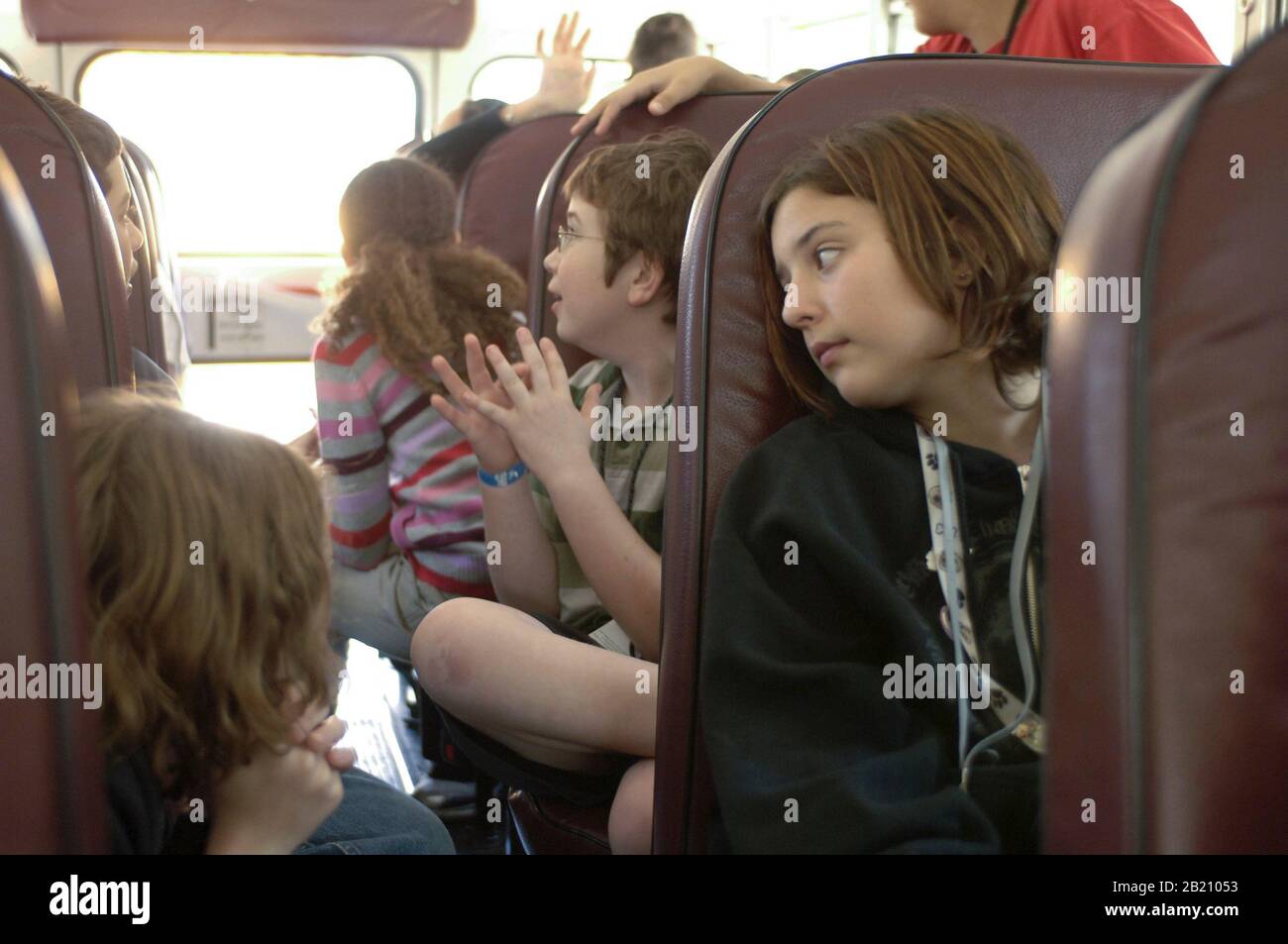 Austin, Texas: Sixth-grade middle school students riding school bus to ...