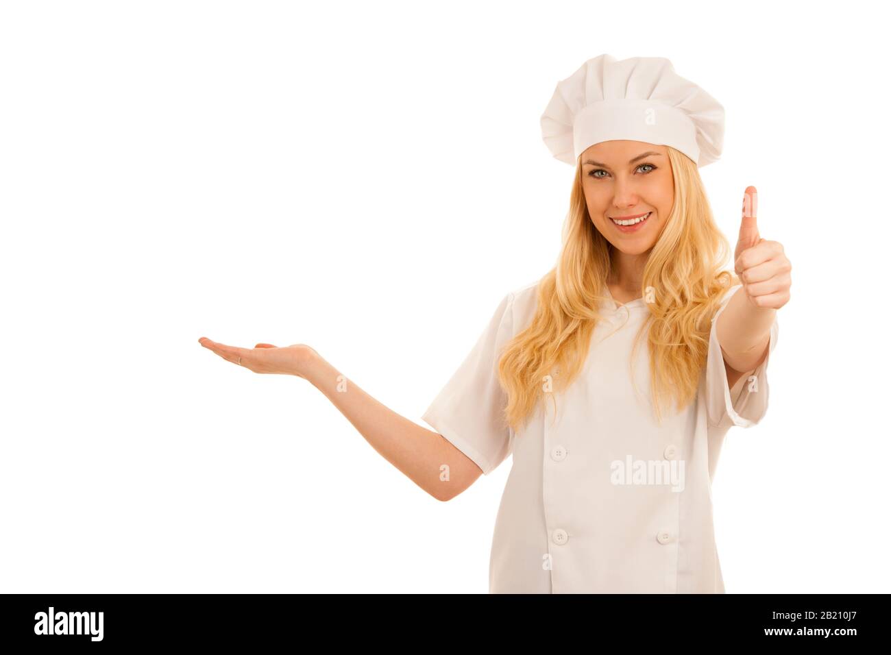 Young blonde chef points to copy space as she presents a new recepy ...