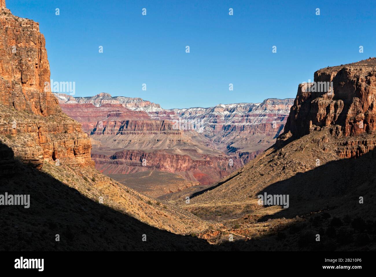 View of Bright Angel Fault and Canyon and the snow-covered North Rim of ...