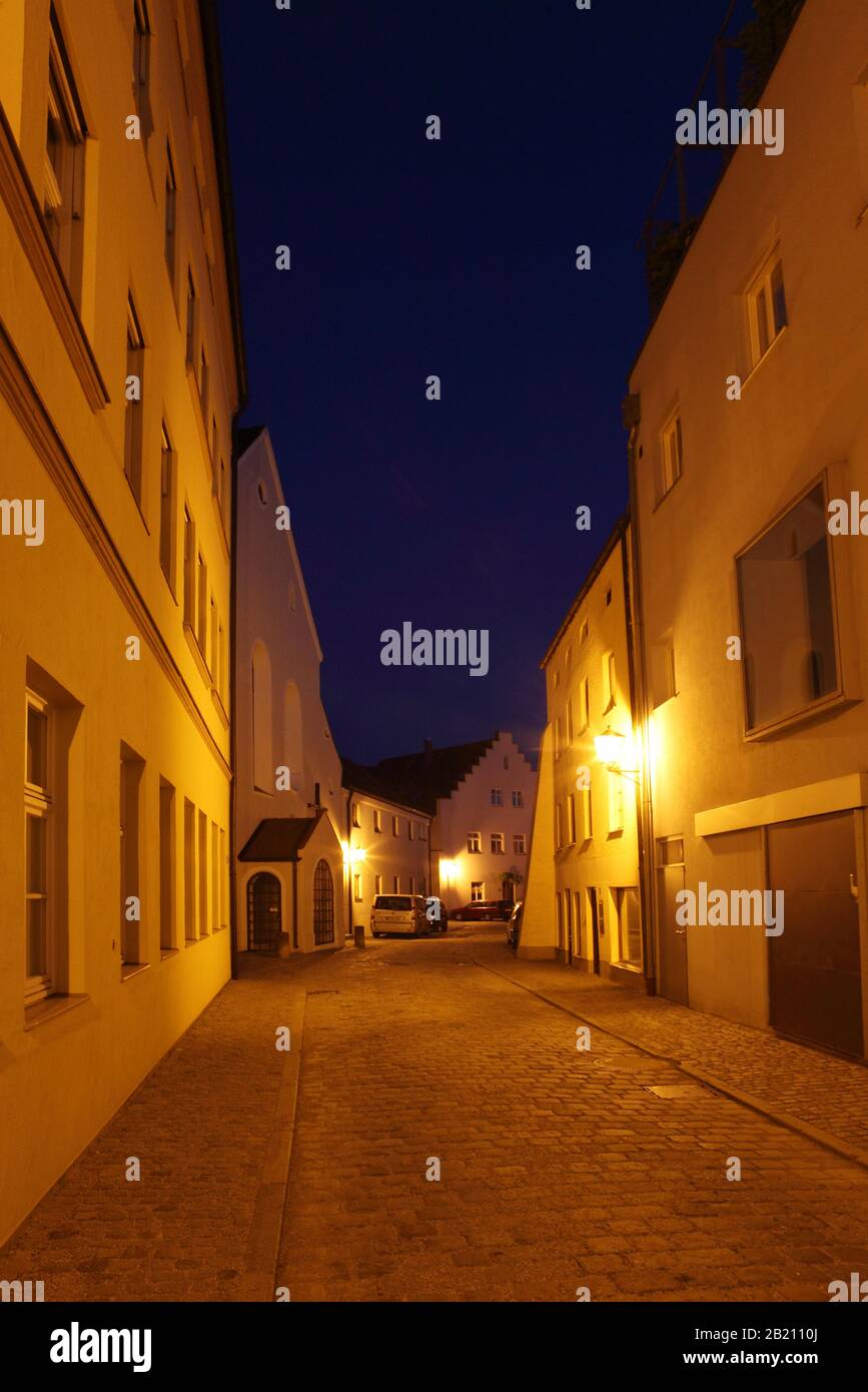 Blue hour in Neuoetting, historical old town, alley, alleyway lighting ...