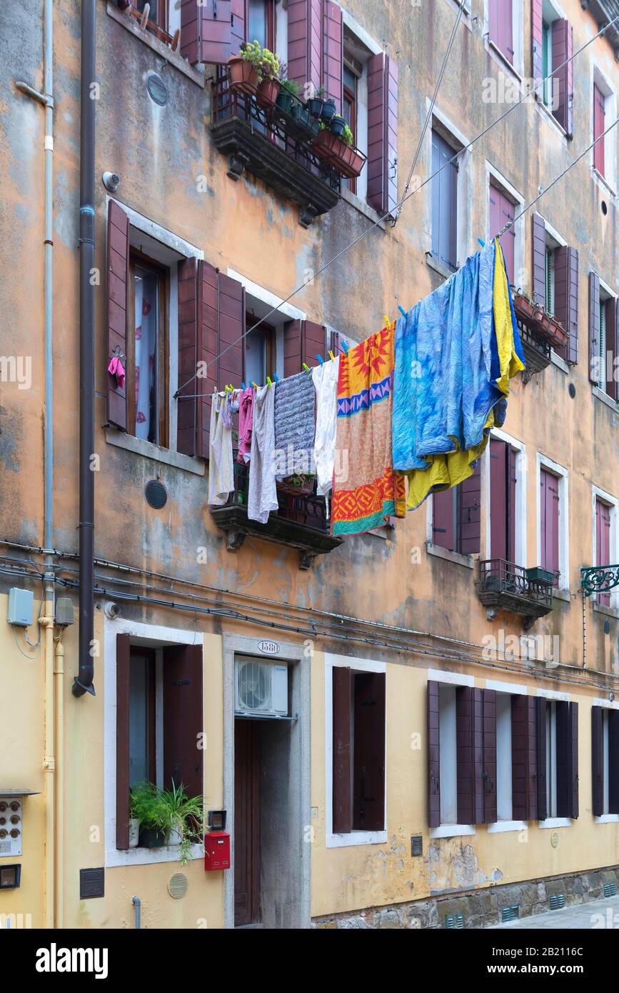Laundry on clothesline between houses hi-res stock photography and ...