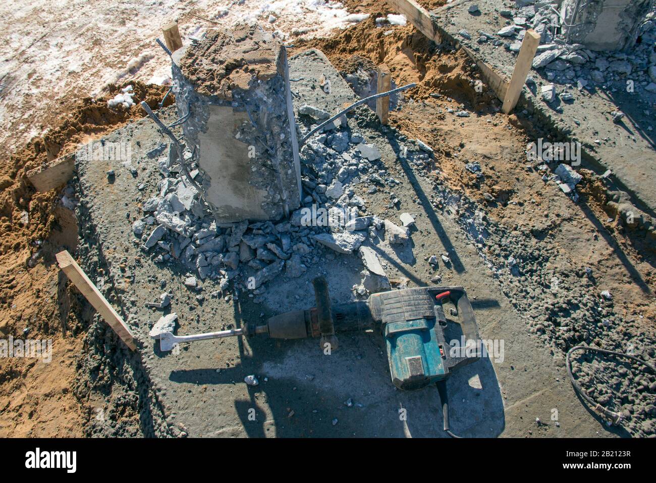 Electric jackhammer on concrete background. Demolition tool Stock Photo ...