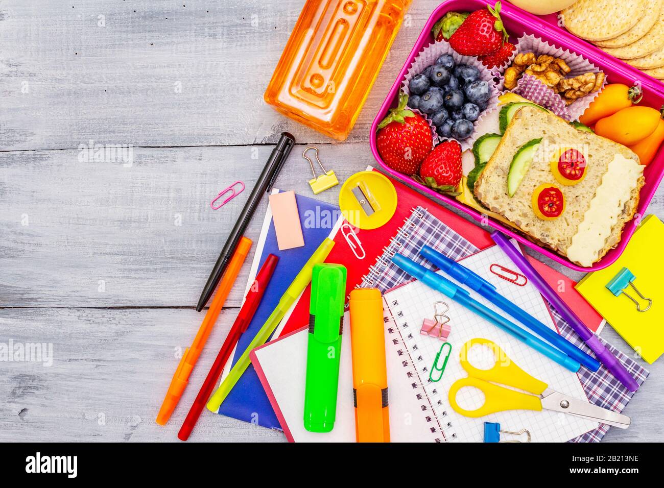 School lunch box with sandwich, fresh fruits, vegetables, cookies ...