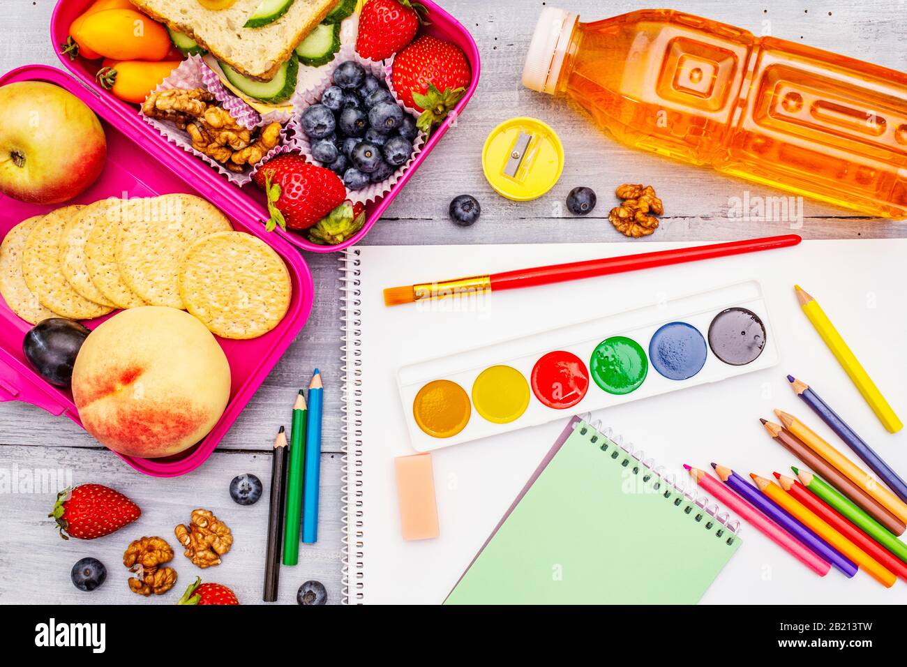 School lunch box with sandwich, fresh fruits, vegetables, cookies ...