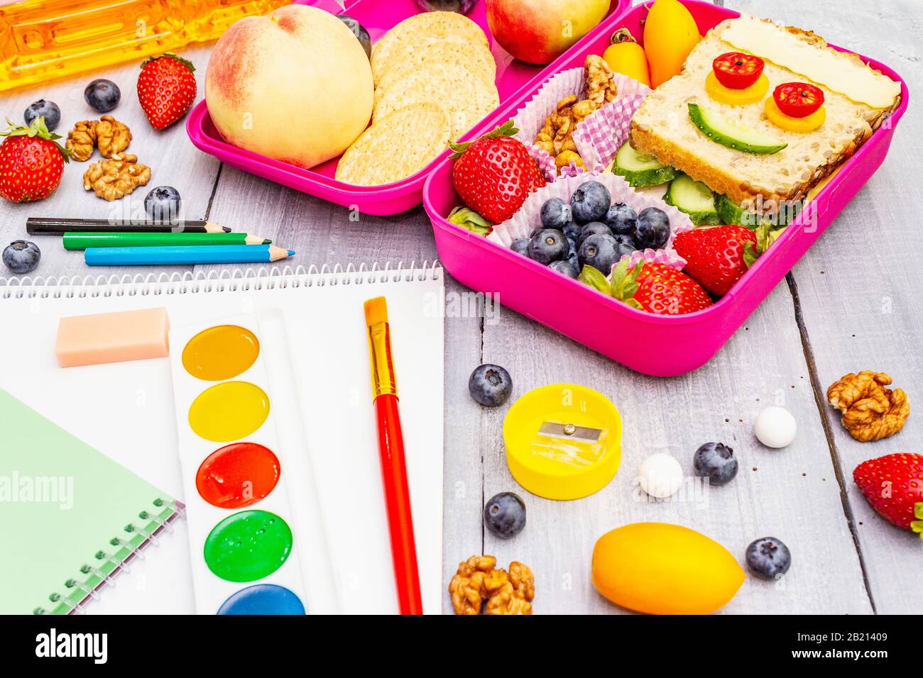 School lunch box with sandwich, fresh fruits, vegetables, cookies ...