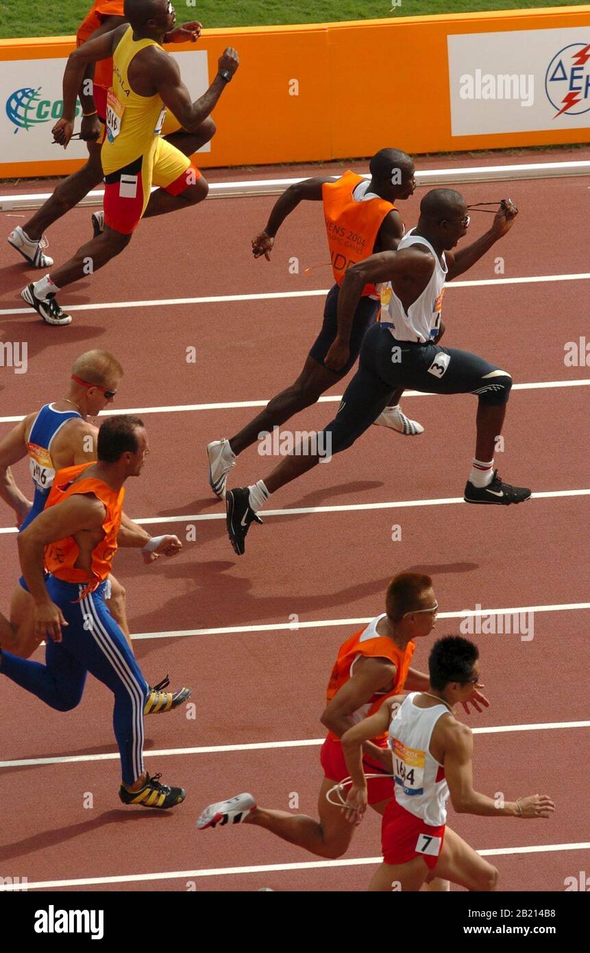 Athens, Greece 21SEP04: Blind runners competing with the help of ...