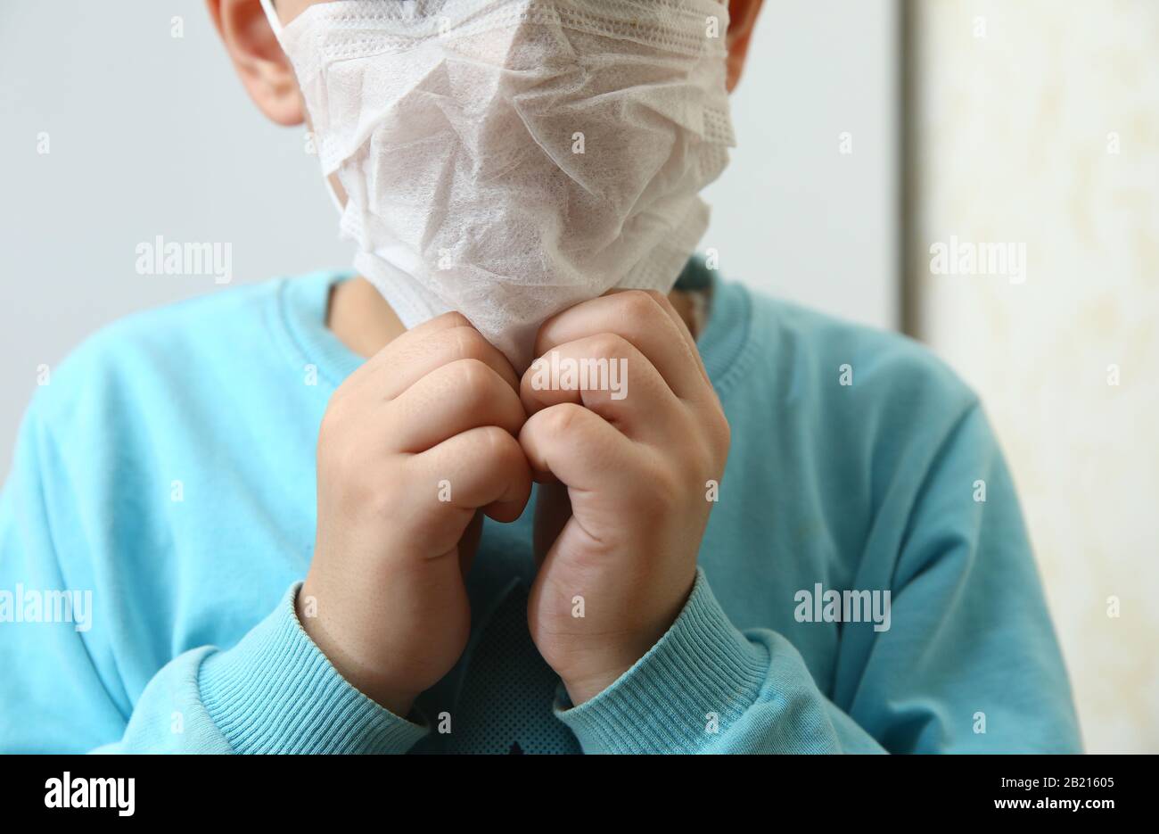 Sick Child wearing surgical mask coughing . Kids wear health masks to ...