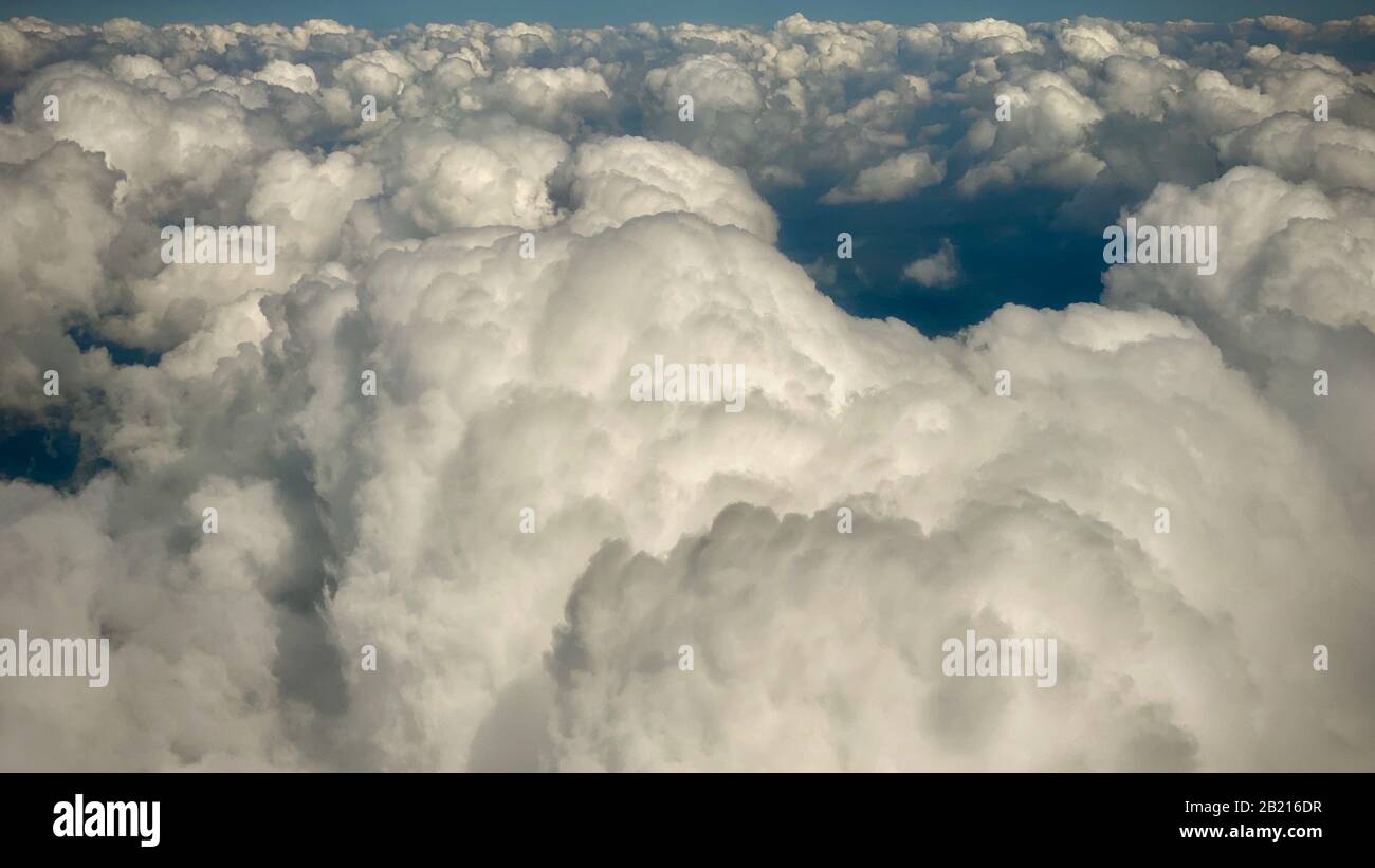 Clouds as viewed through jet window Stock Photo - Alamy