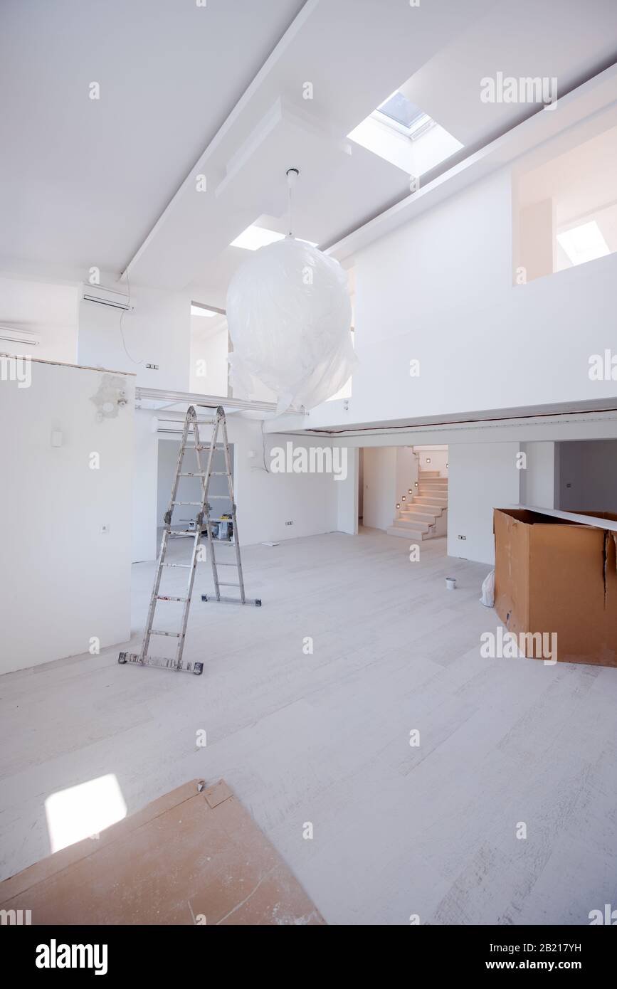 ladder in Interior of apartment during construction, remodeling ...