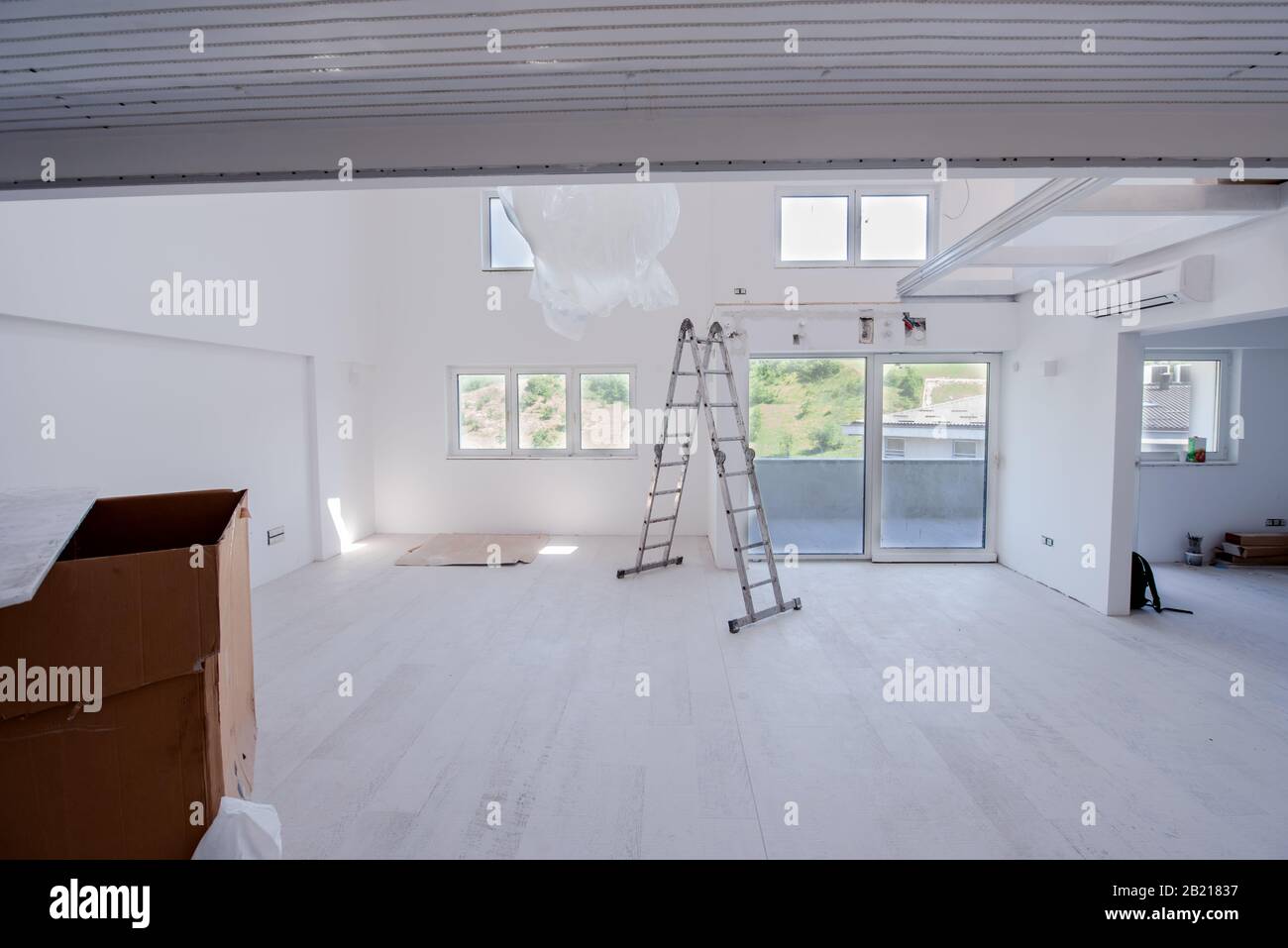 ladder in Interior of apartment during construction, remodeling ...