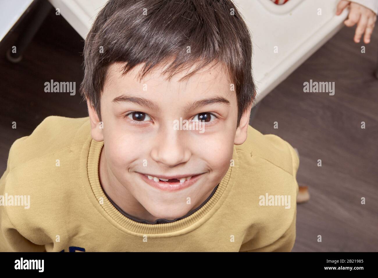 Child 7 years old smiles view from above portrait close-up Stock Photo ...