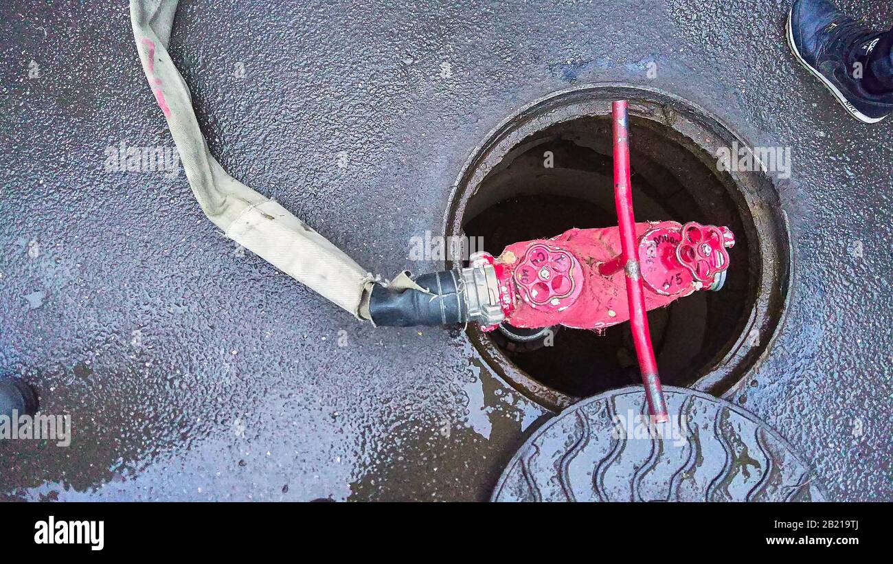 typical Russian red fire hydrant underground Stock Photo - Alamy
