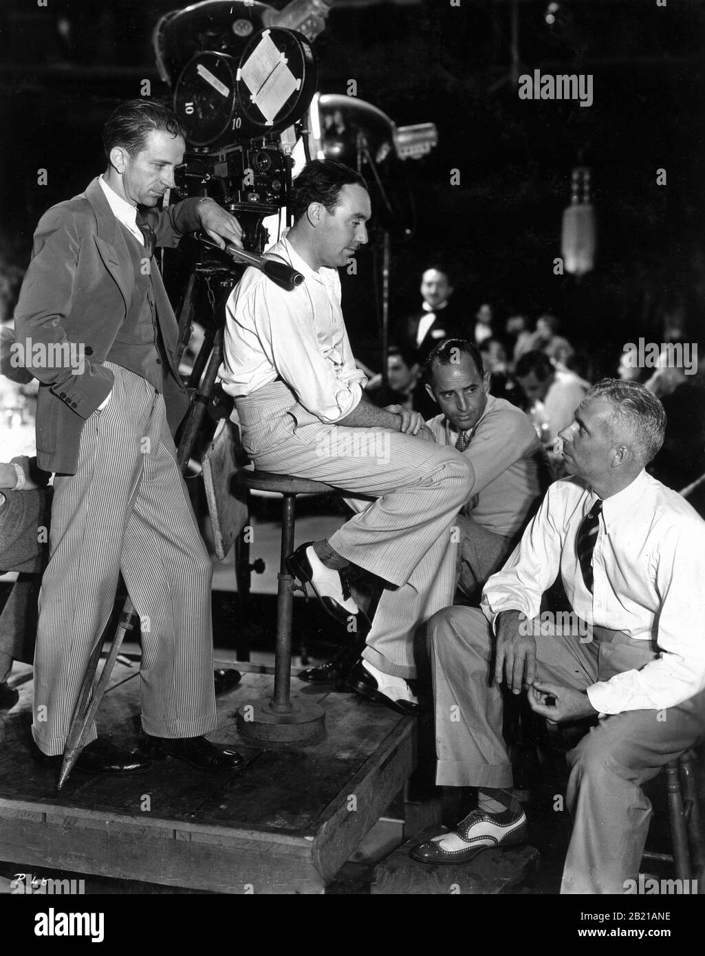 Director RICHARD ROSSON at centre and Director HOWARD HAWKS sitting at ...