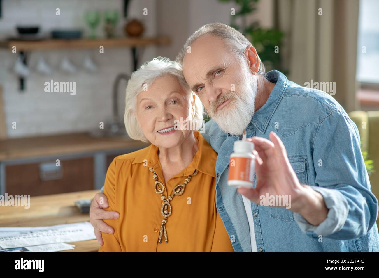 Elderly married good-looking couple demonstrating healthy lifestyle ...
