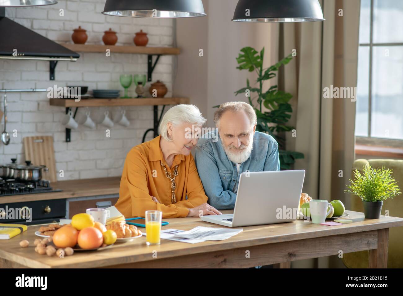 Elderly couple having video call hi-res stock photography and images ...