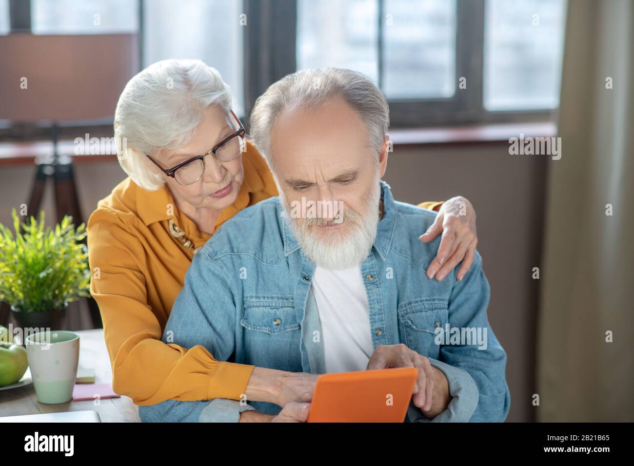 Elderly man woman learning hi-res stock photography and images - Alamy