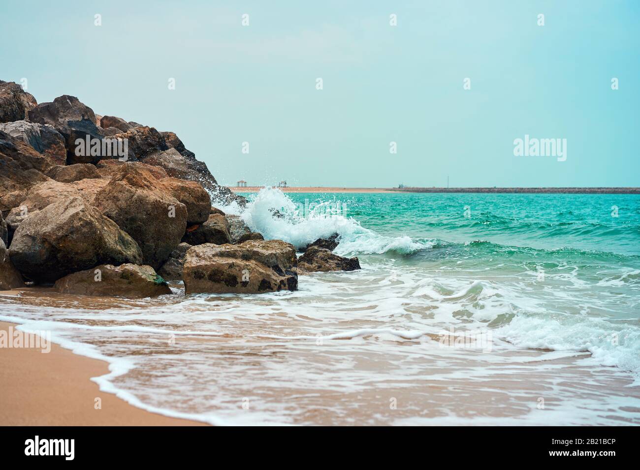 waves of the sea beating on the coastal rocks Stock Photo - Alamy