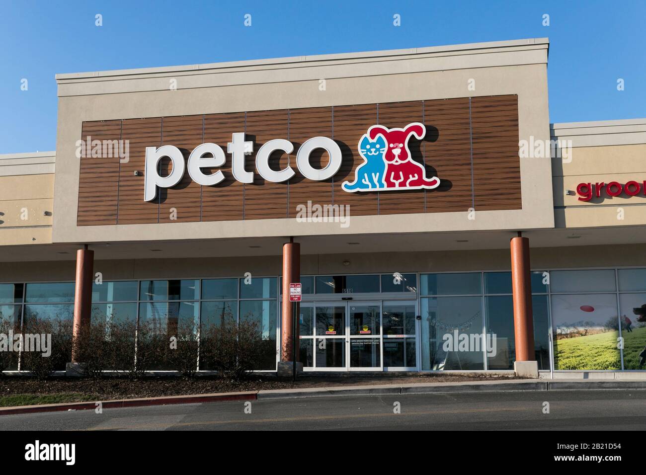 A logo sign outside of a Petco retail store location in Baltimore ...