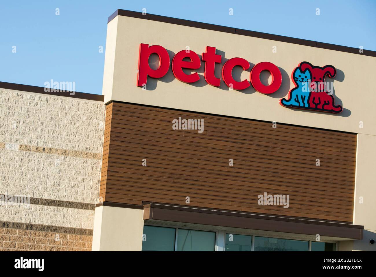 A logo sign outside of a Petco retail store location in Nottingham ...