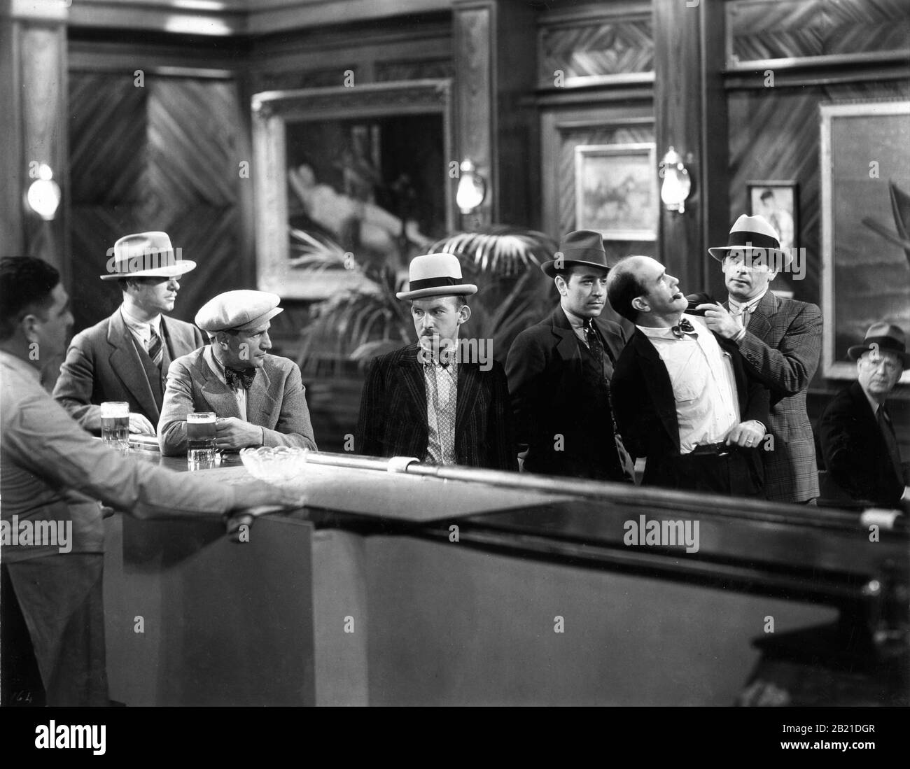 VINCE BARNETT GEORGE RAFT and PAUL MUNI as Tony Camonte in SCARFACE ...