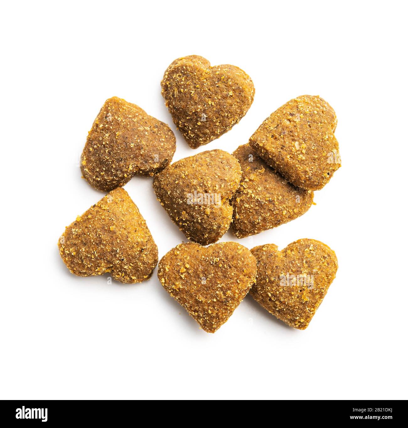 Dried kibble pet food. Heart shape dried animal food isolated on white ...