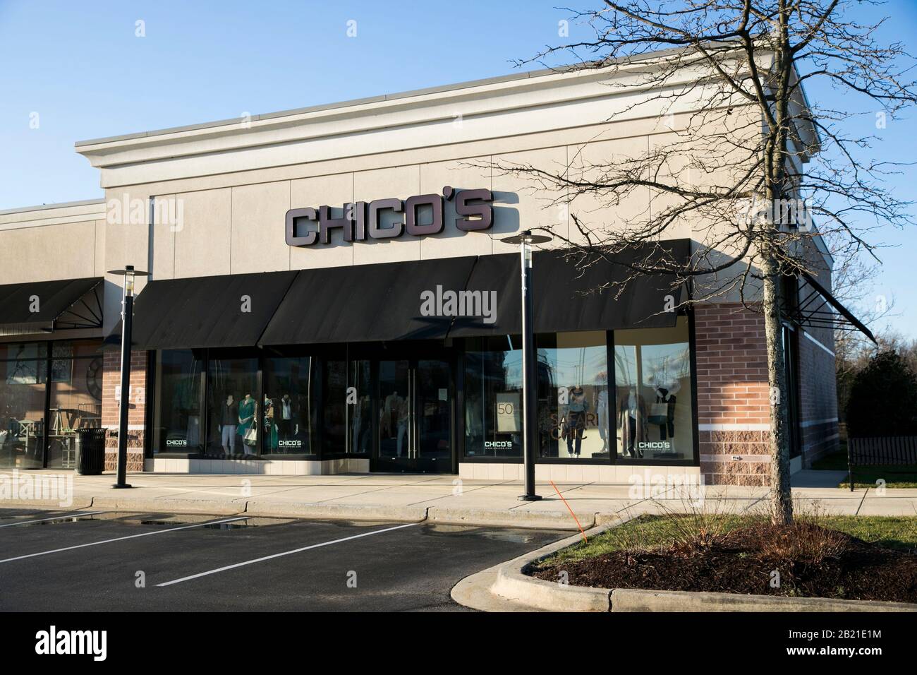 A logo sign outside of a Chico's retail store location in Waldorf ...