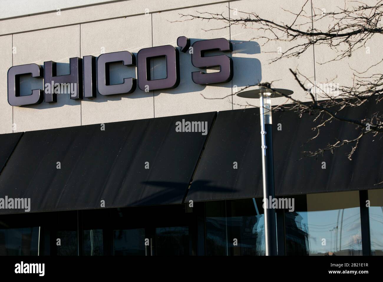 A logo sign outside of a Chico's retail store location in Waldorf ...