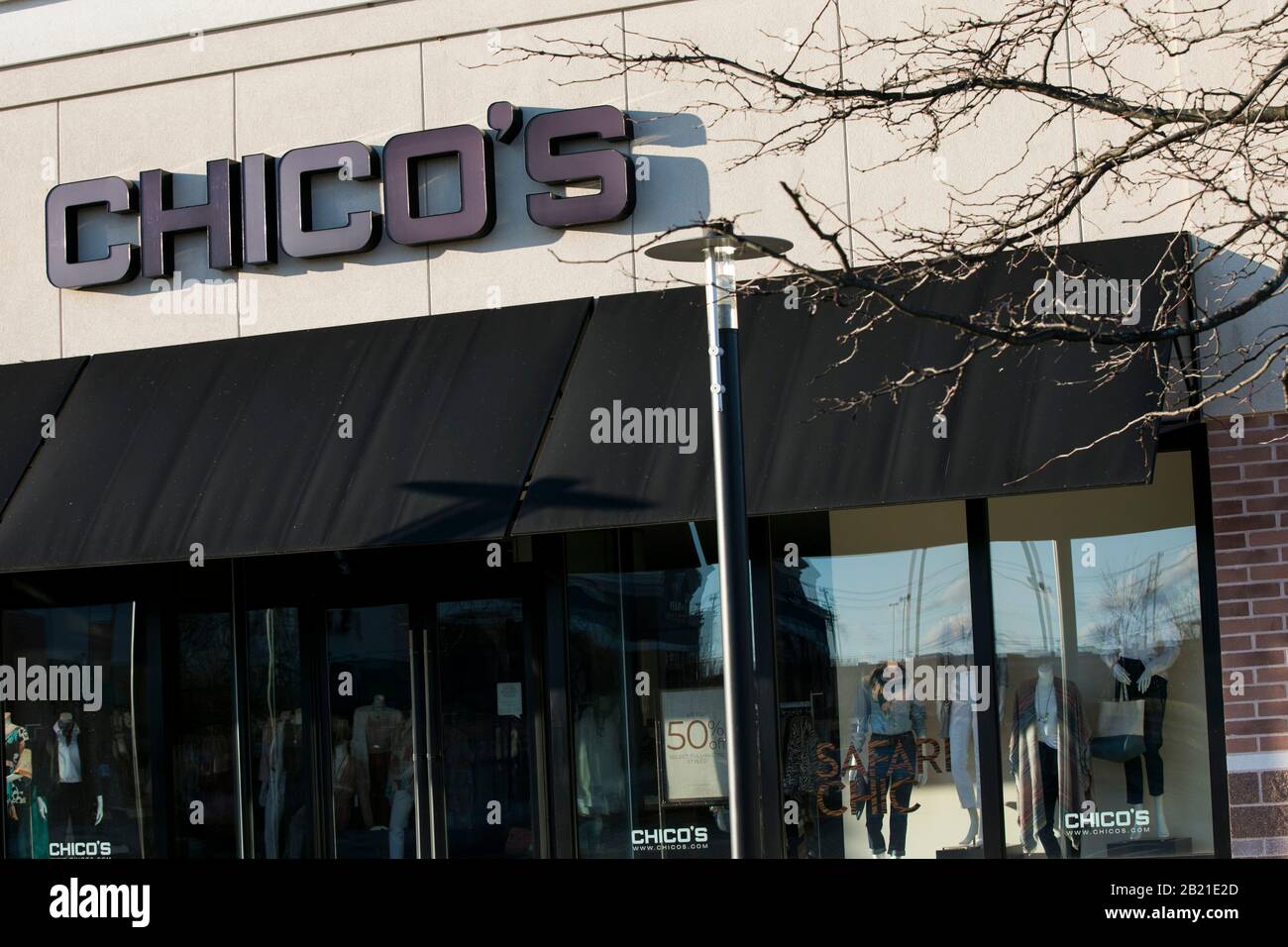 A logo sign outside of a Chico's retail store location in Waldorf ...
