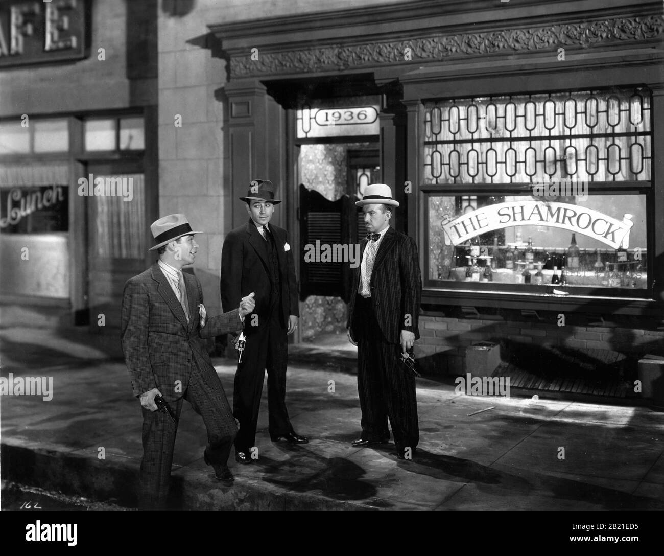 PAUL MUNI as Tony Camonte GEORGE RAFT and VINCE BARNETT in SCARFACE ...