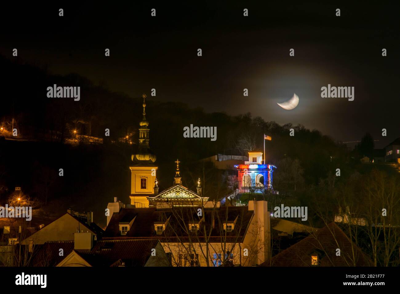 View at Prague and moon at night Stock Photo - Alamy