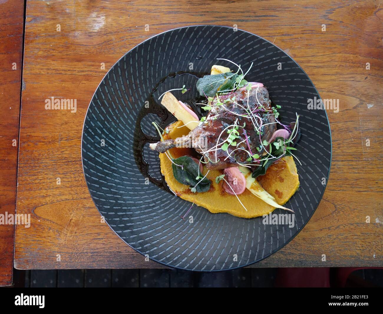 A attractive serving of lamb chop, salad and vegetables Stock Photo - Alamy