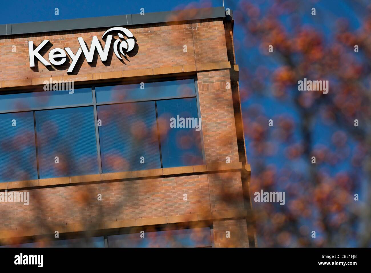 A logo sign outside of the headquarters of KeyW in Hanover, Maryland on ...