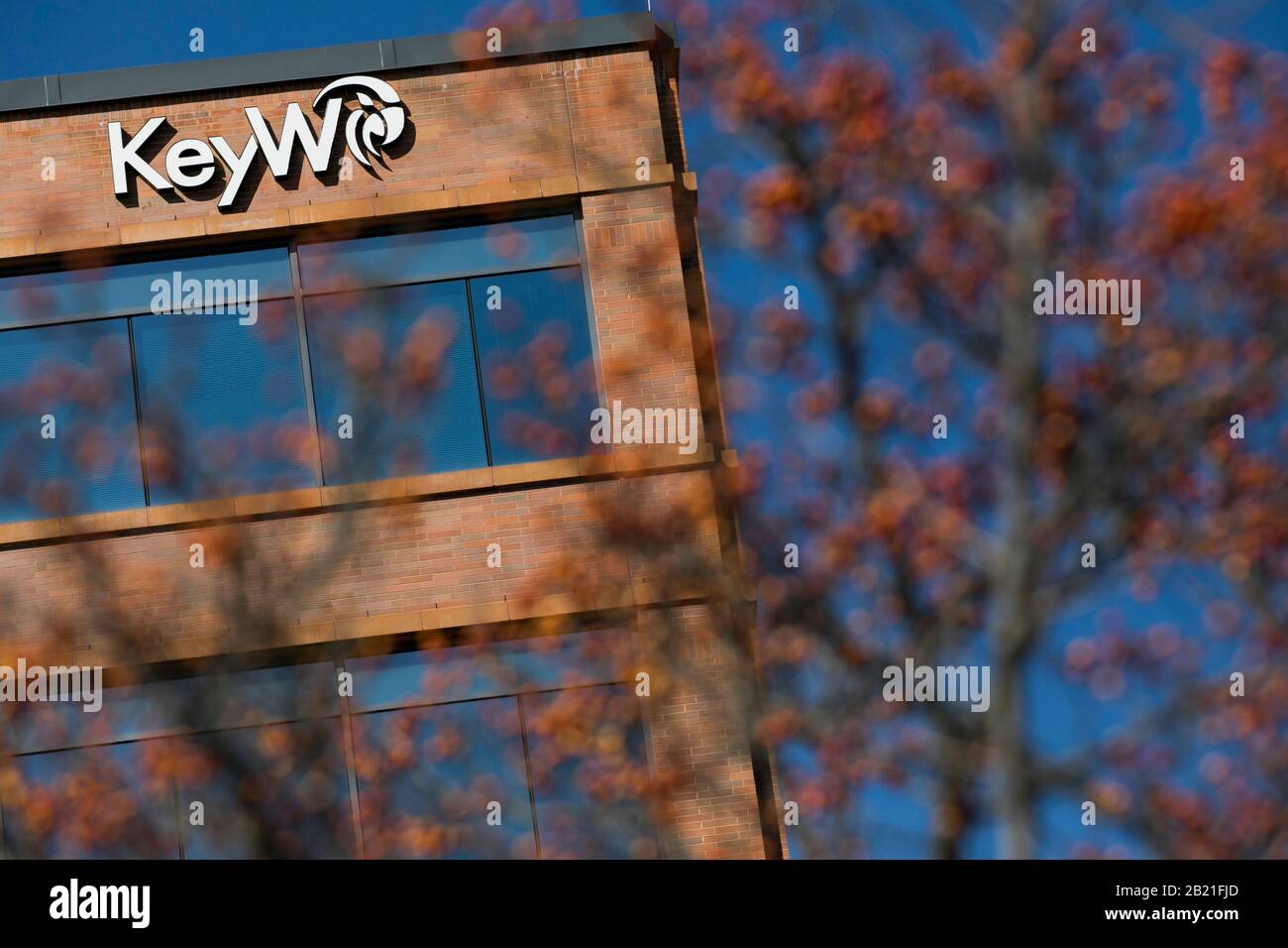 A logo sign outside of the headquarters of KeyW in Hanover, Maryland on ...