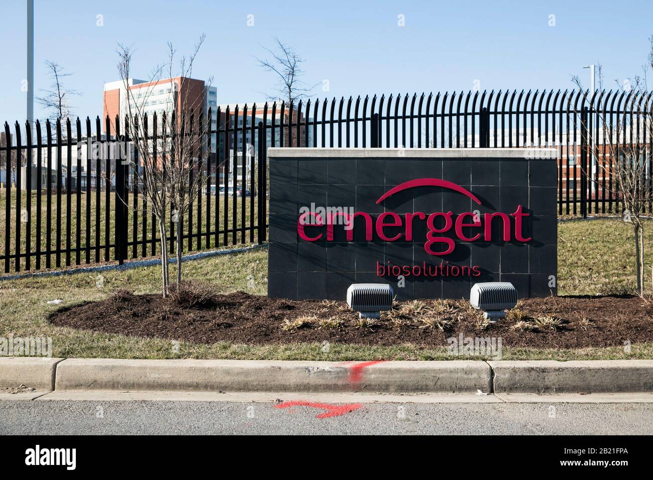 A logo sign outside of a facility occupied by Emergent BioSolutions in ...