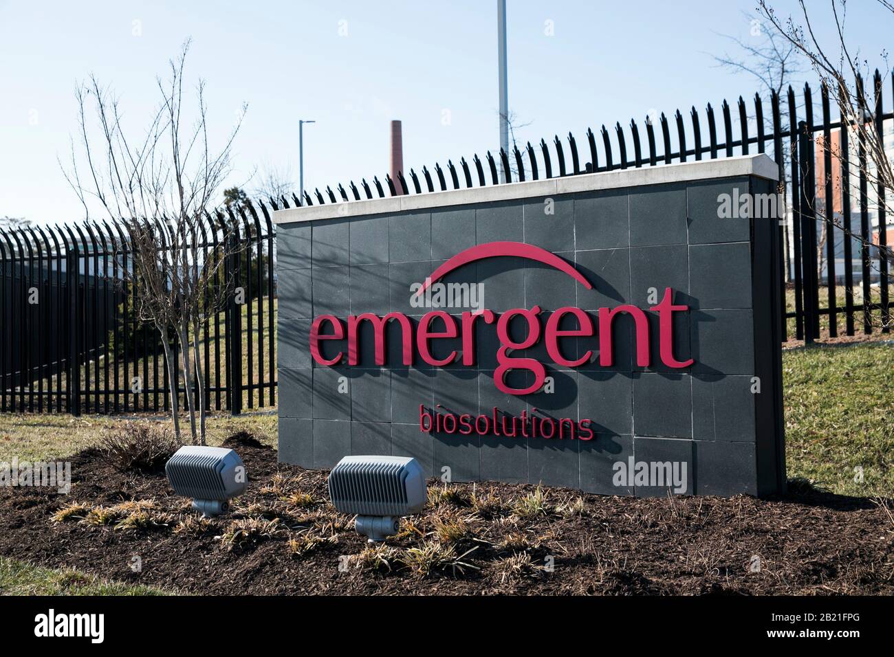 A logo sign outside of a facility occupied by Emergent BioSolutions in ...