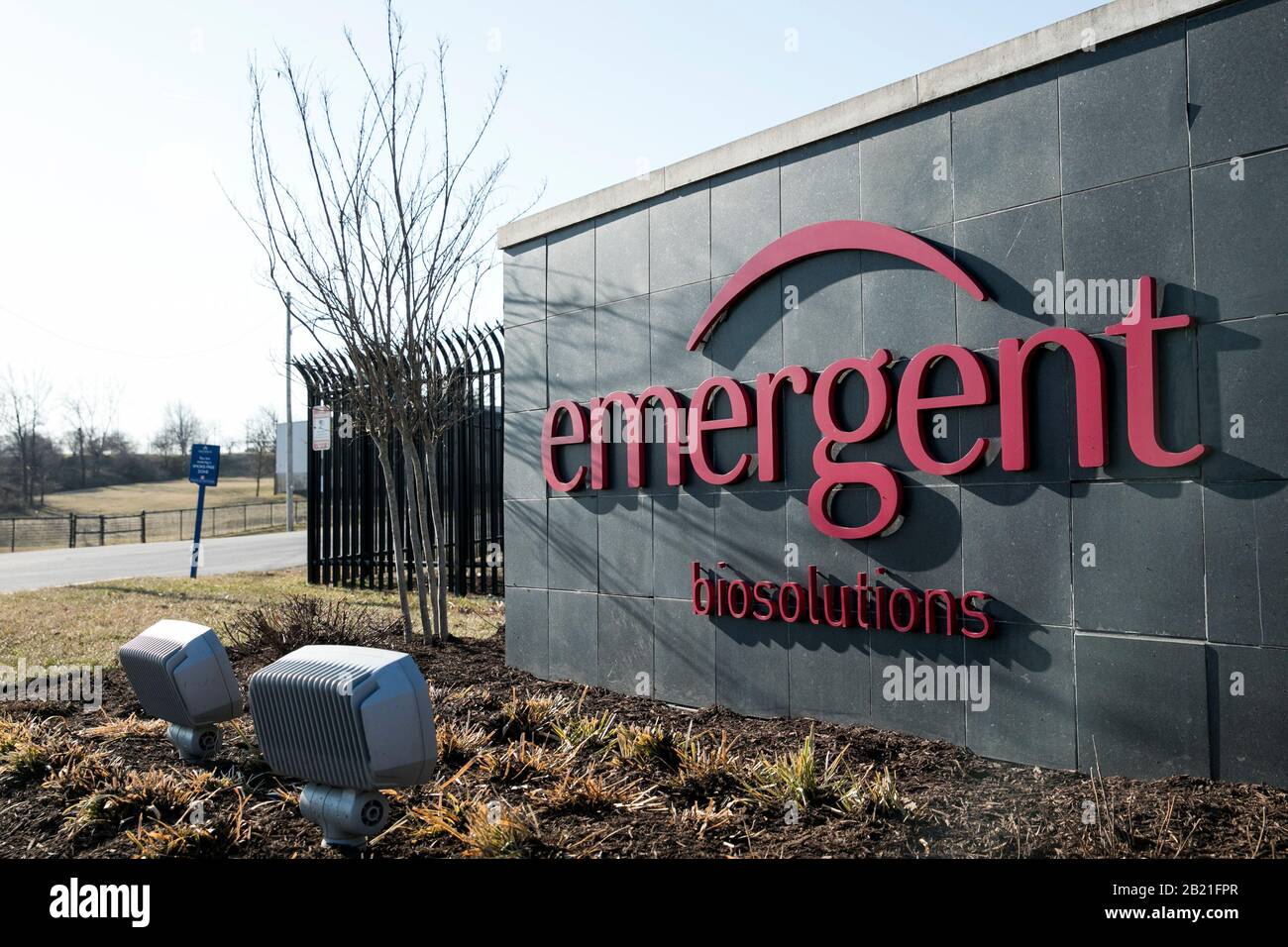A logo sign outside of a facility occupied by Emergent BioSolutions in ...