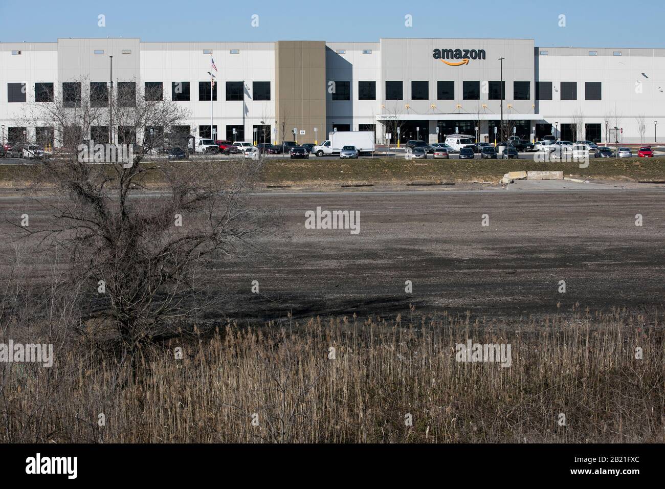 A logo sign outside of a Amazon fulfillment center in Baltimore ...