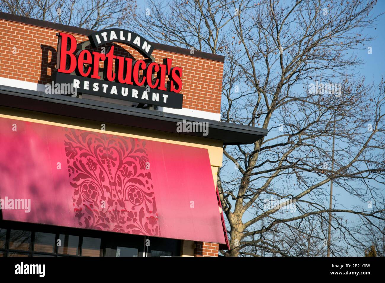 A logo sign outside of Bertucci's restaurant location in Baltimore ...