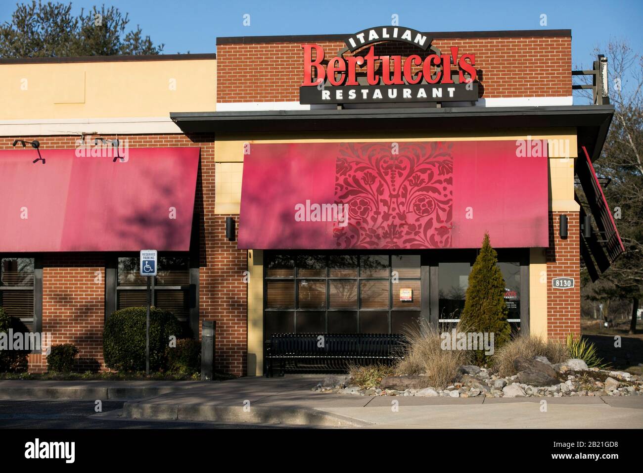 A logo sign outside of Bertucci's restaurant location in Baltimore ...
