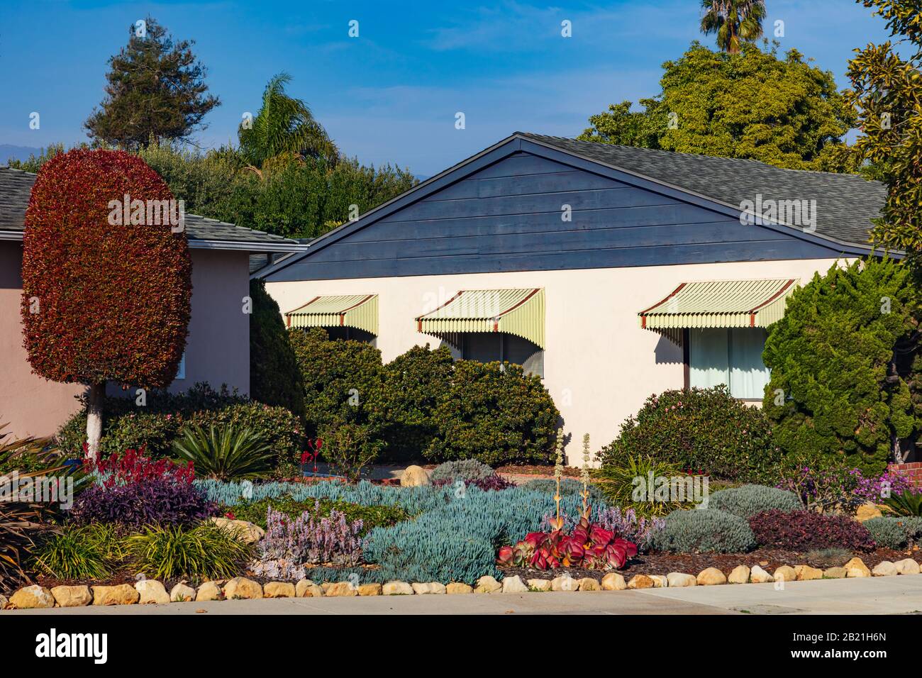 Beautiful California home exterior with a custom landscaped garden and ...
