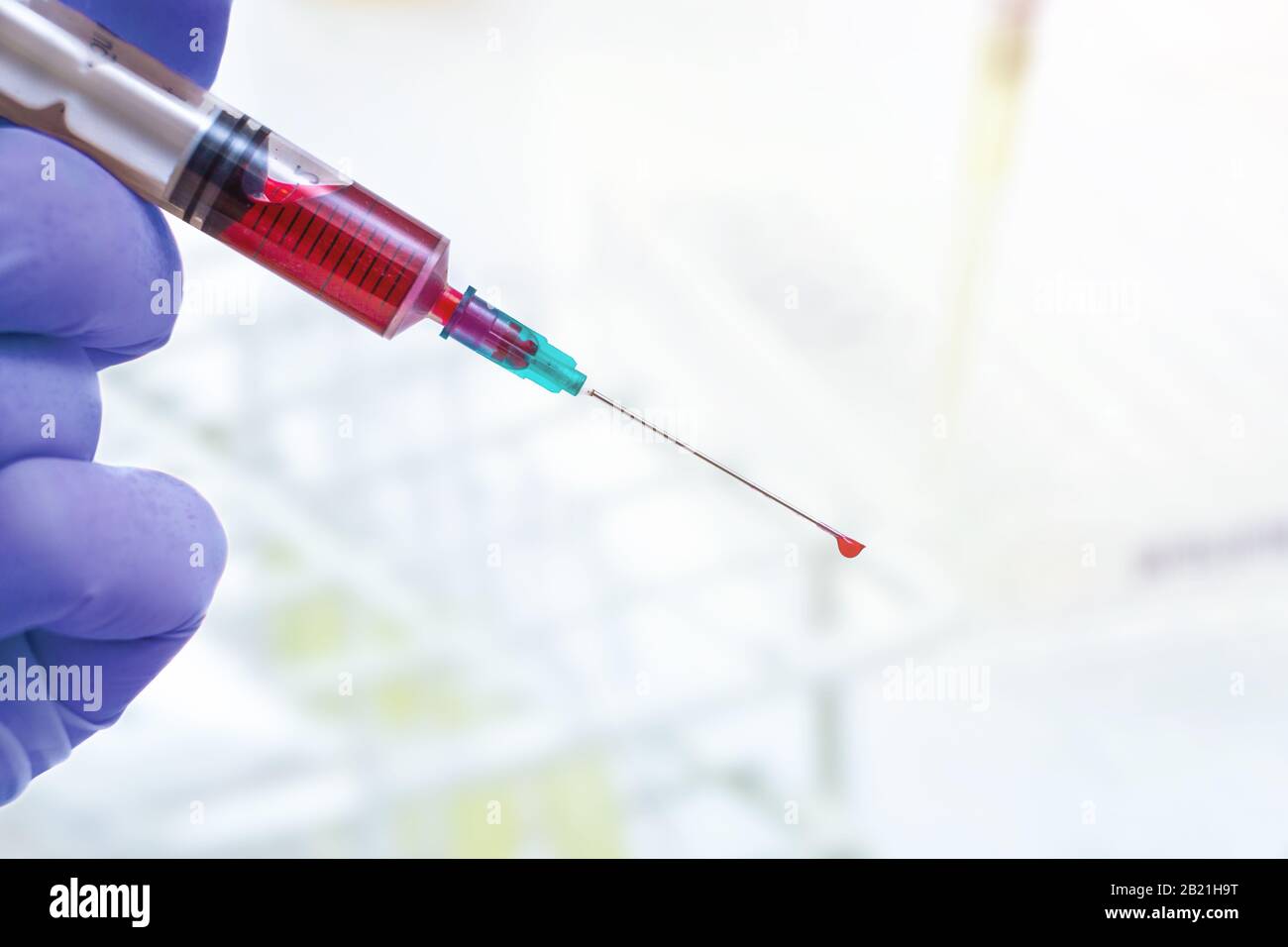 Blood test tube syringe hi-res stock photography and images - Alamy