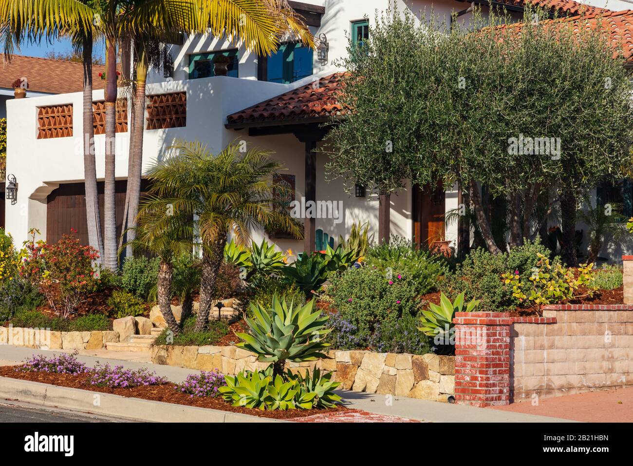 Beautiful California home exterior with a custom landscaped garden and ...