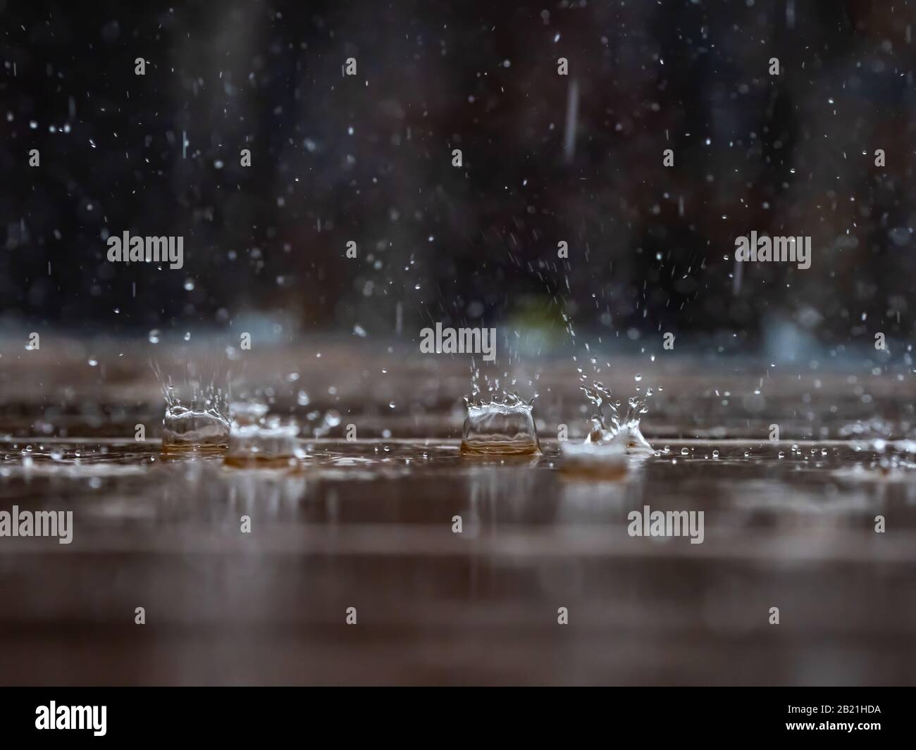 Raindrop splashing hi-res stock photography and images - Alamy