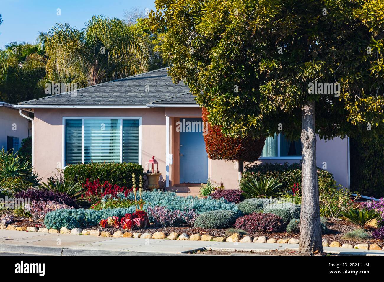 Beautiful California cottage home exterior with a custom landscaped ...