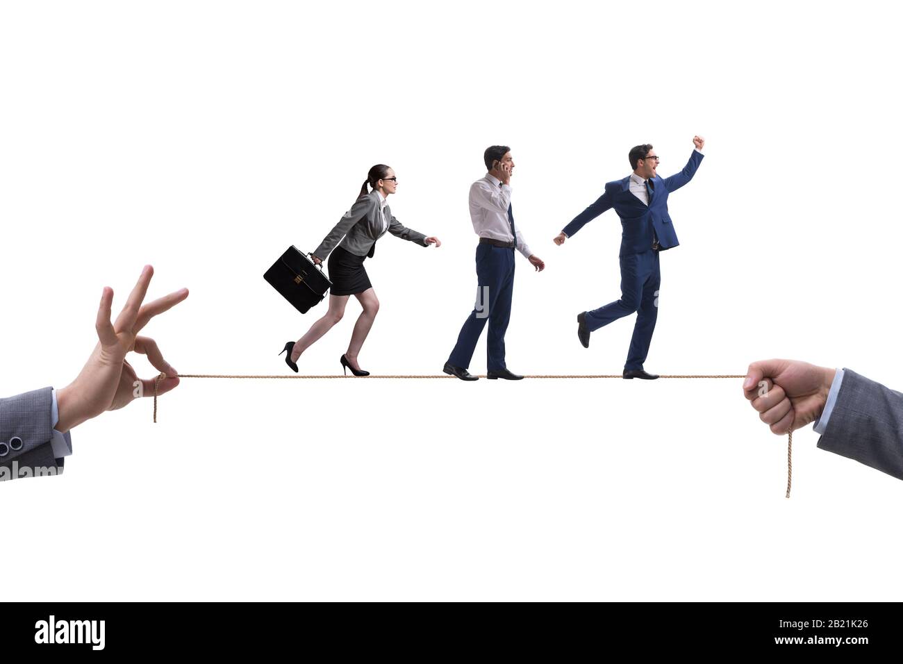 The business people walking on tight rope Stock Photo - Alamy